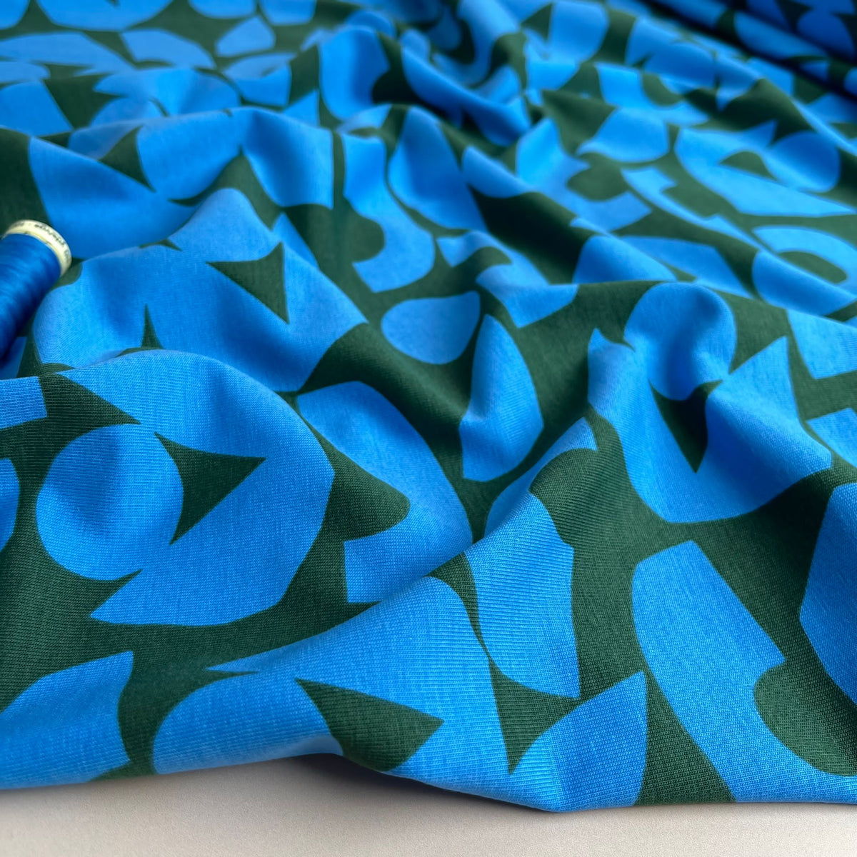 Blue Shapes on Khaki Combed Cotton Jersey Fabric – Lamazi Fabrics