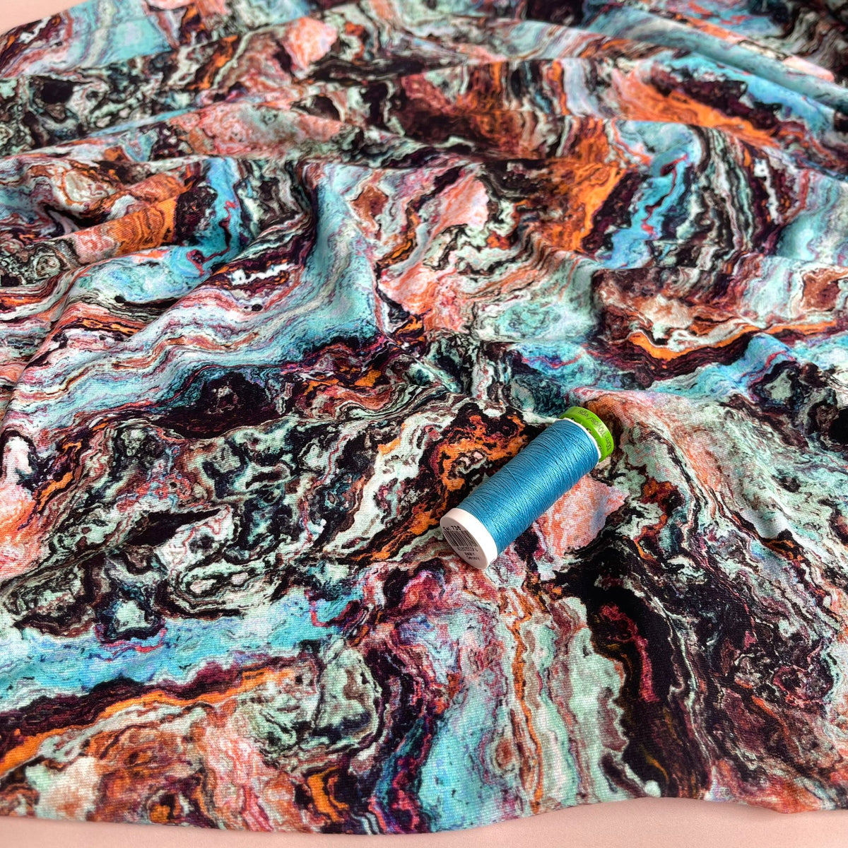 Ocean Sunrise Marble Viscose Jersey Fabric – Lamazi Fabrics